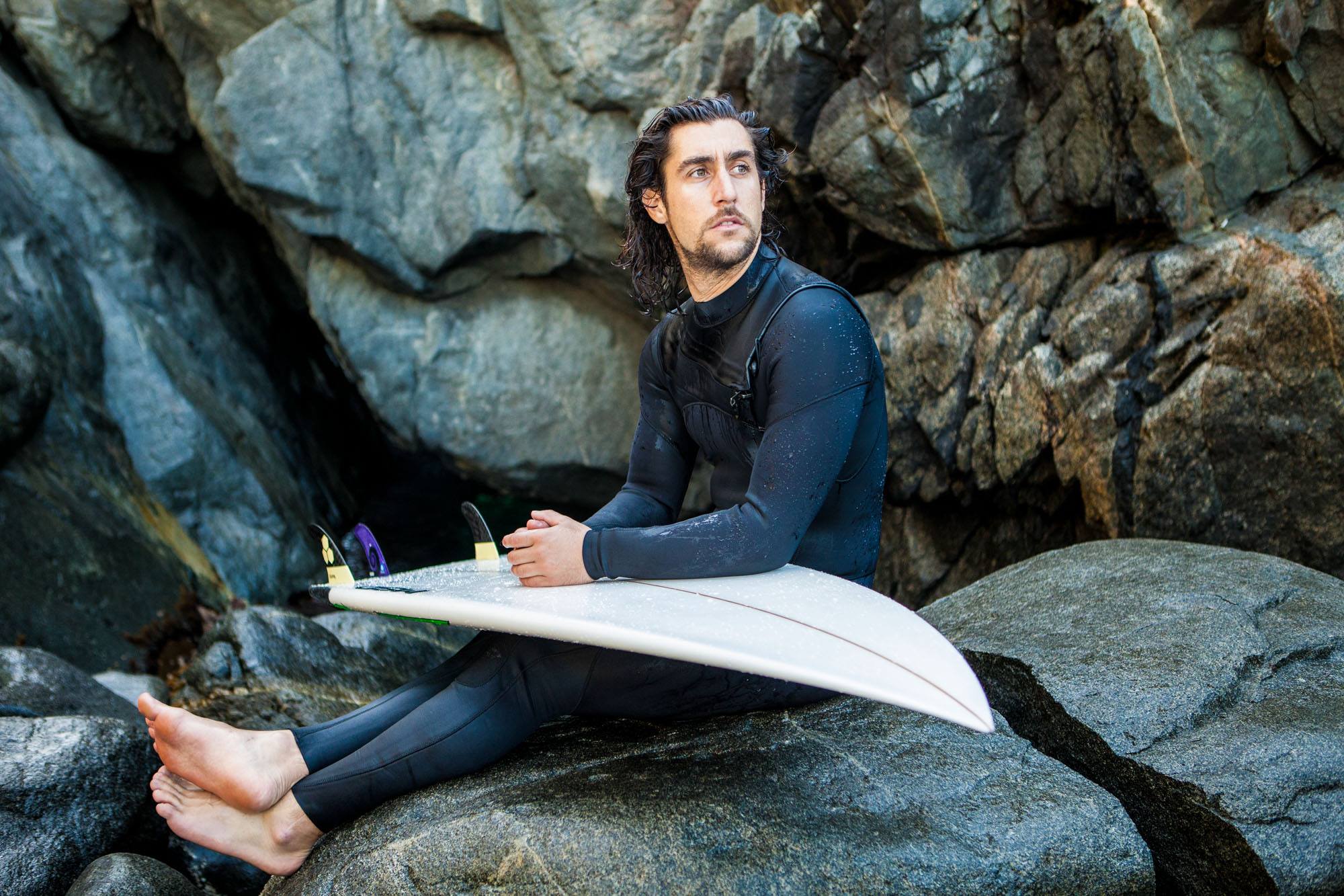 Alessandro Piu surfa needESSENTIALS Wetsuits - 4ActionSport